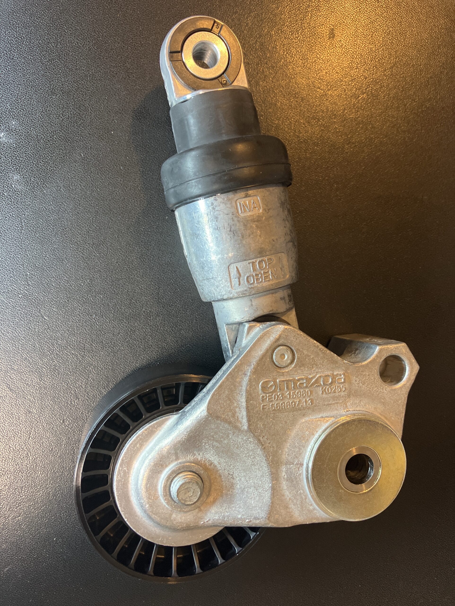 New Mazda CX belt tensioner replacement-PE03-15-980C